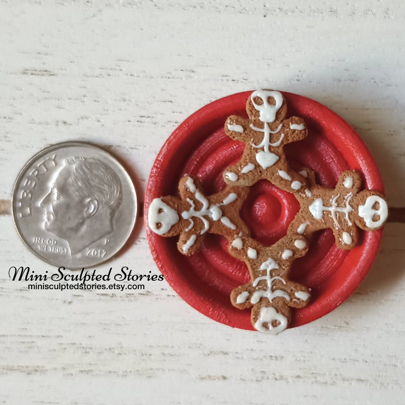 Spooky-cute Miniature Skeleton Gingerbread Man Cookies on a Red Platter ...