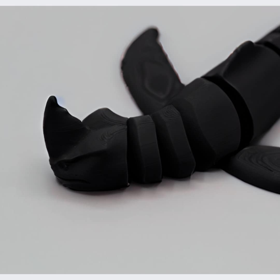 The Red Bluster Flexible Toy in Midnight Black - Etsy