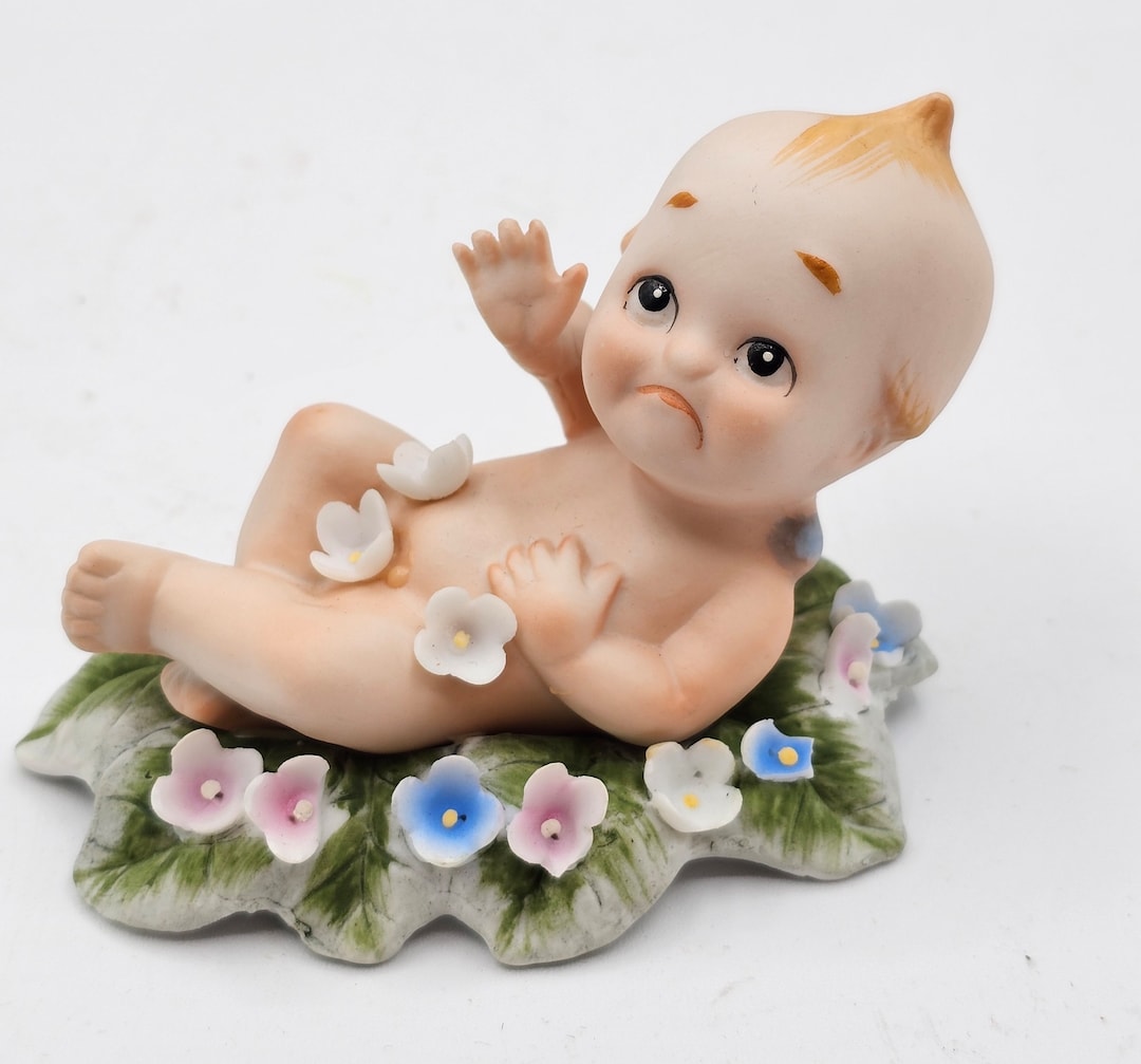 1960s Lefton Kewpie Laying in Bed of Flowers - Etsy