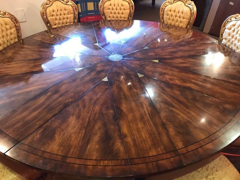 A Truly Magnificent Sunburst Flame Mahogany Jupe Extending Circular ...