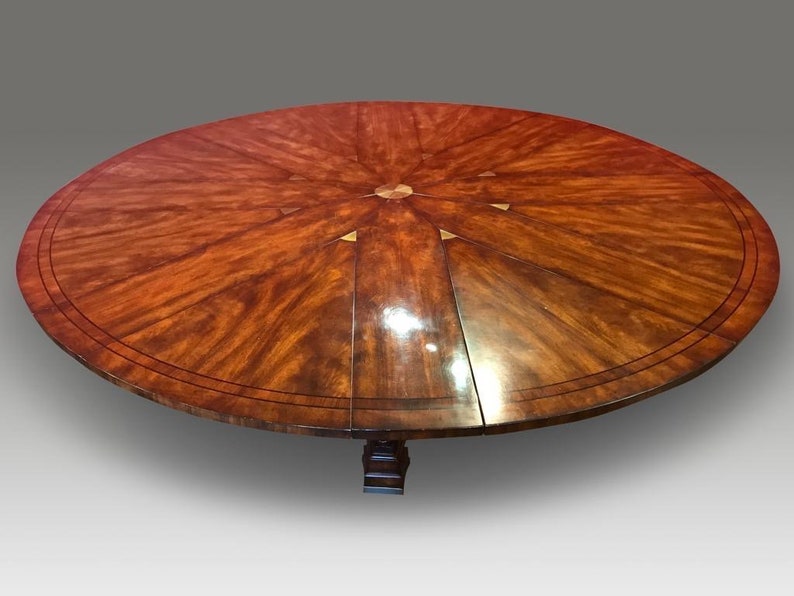 A Truly Magnificent Sunburst Flame Mahogany Jupe Extending Circular ...