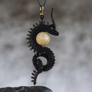 Black Dragon Pendant With Golden Eyes and Mate Golden Dragon Egg - Etsy