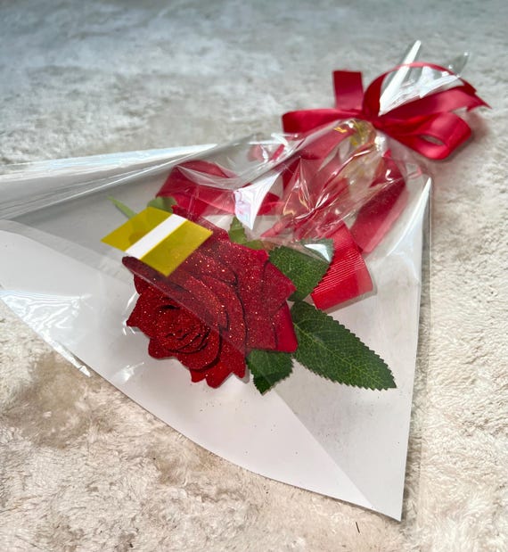 Single Red Rose In Cellophane