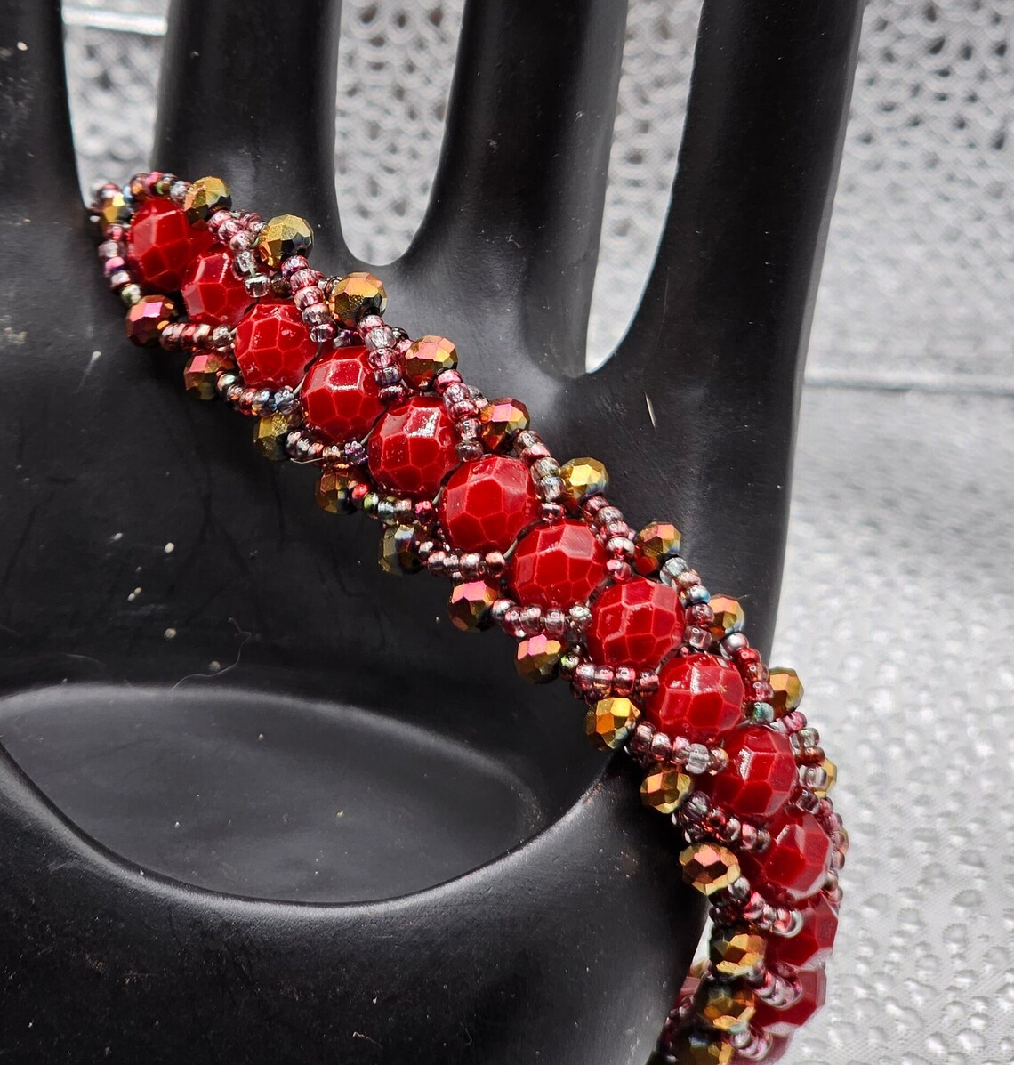 Red Glass Fauceted Bead Bracelet Surrounded by Iris Seed Beads and Fire ...