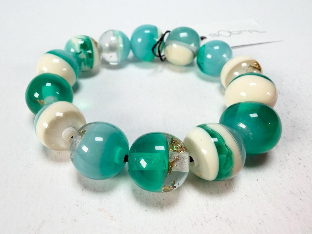 Sobral - Planets "orbitalis" Neptune Elasticated Resin Bracelet ...