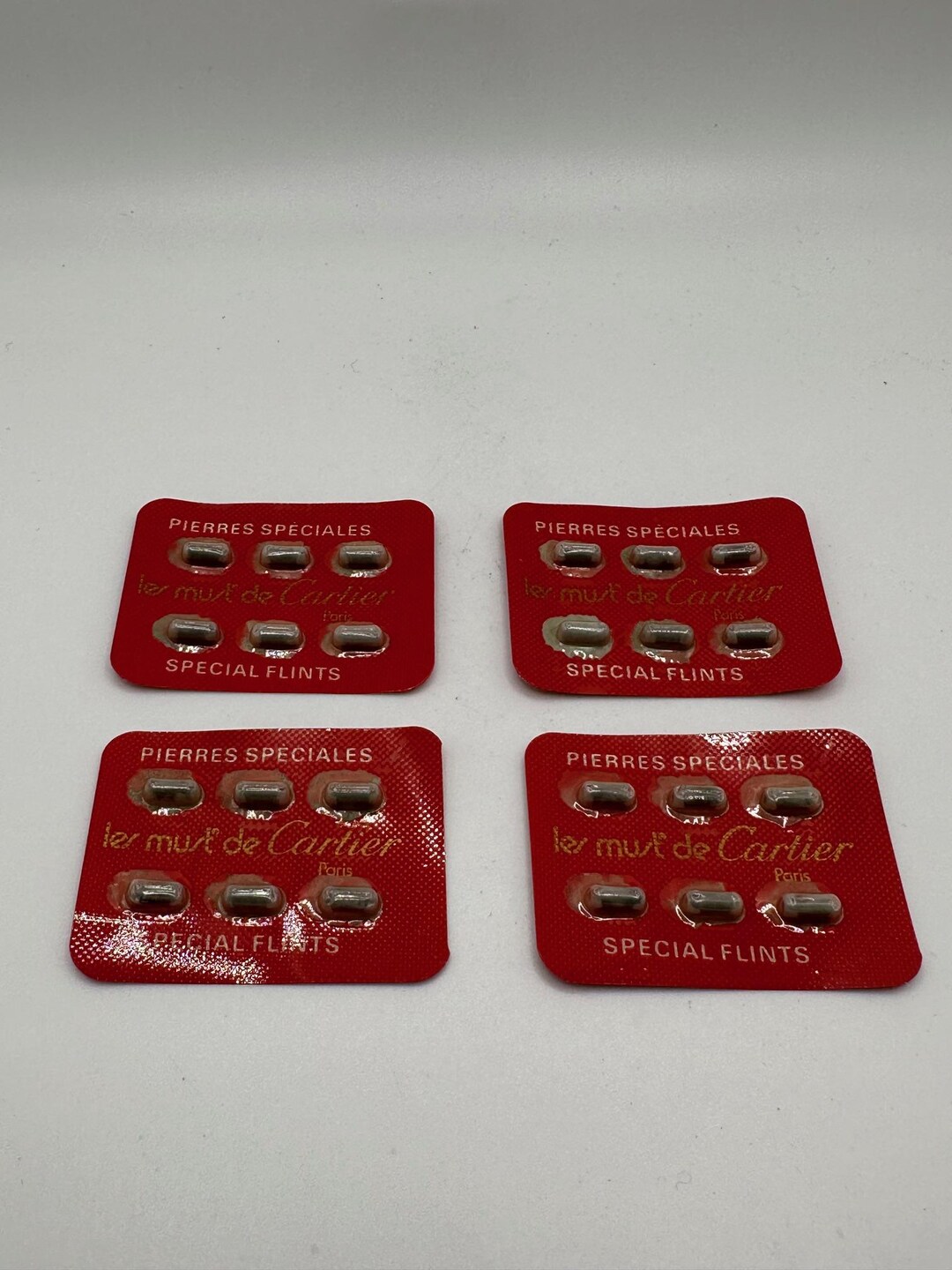 Cartier Genuine NOS OEM Lighter Flints 4 Packs of 6 Flints Each - Ships ...