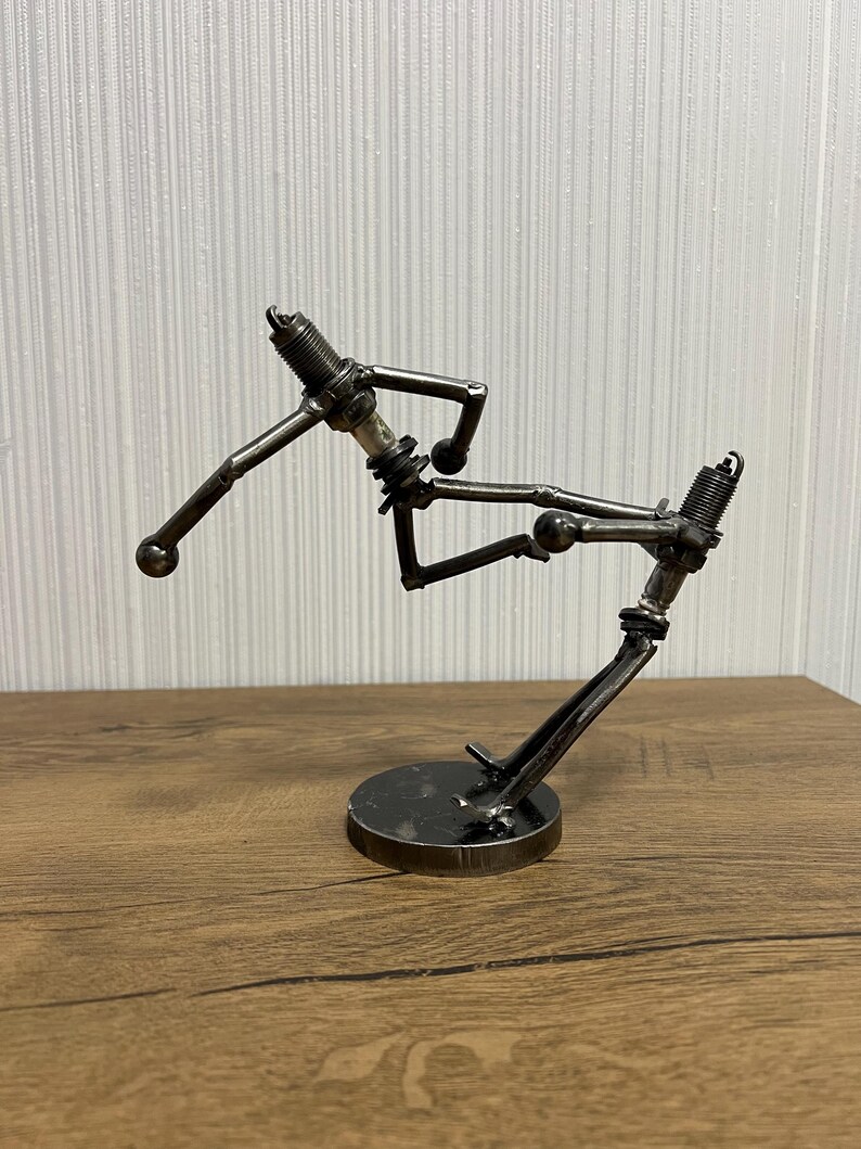 Car Spark Plugs in Sparring, One in the Jump 7 Scrap Art Modern Welded ...