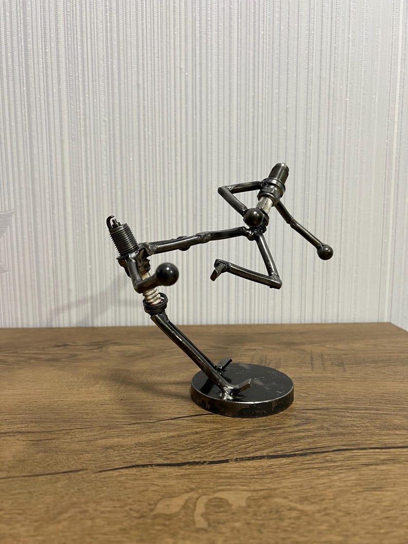 Car Spark Plugs in Sparring, One in the Jump 7 Scrap Art Modern Welded ...