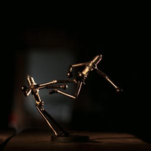 Car Spark Plugs in Sparring, One in the Jump 7 Scrap Art Modern Welded ...