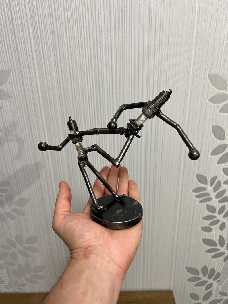 Car Spark Plugs in Sparring, One in the Jump 7 Scrap Art Modern Welded ...