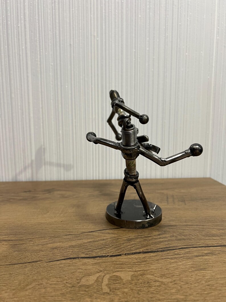 Car Spark Plugs in Sparring, One in the Jump 7 Scrap Art Modern Welded ...