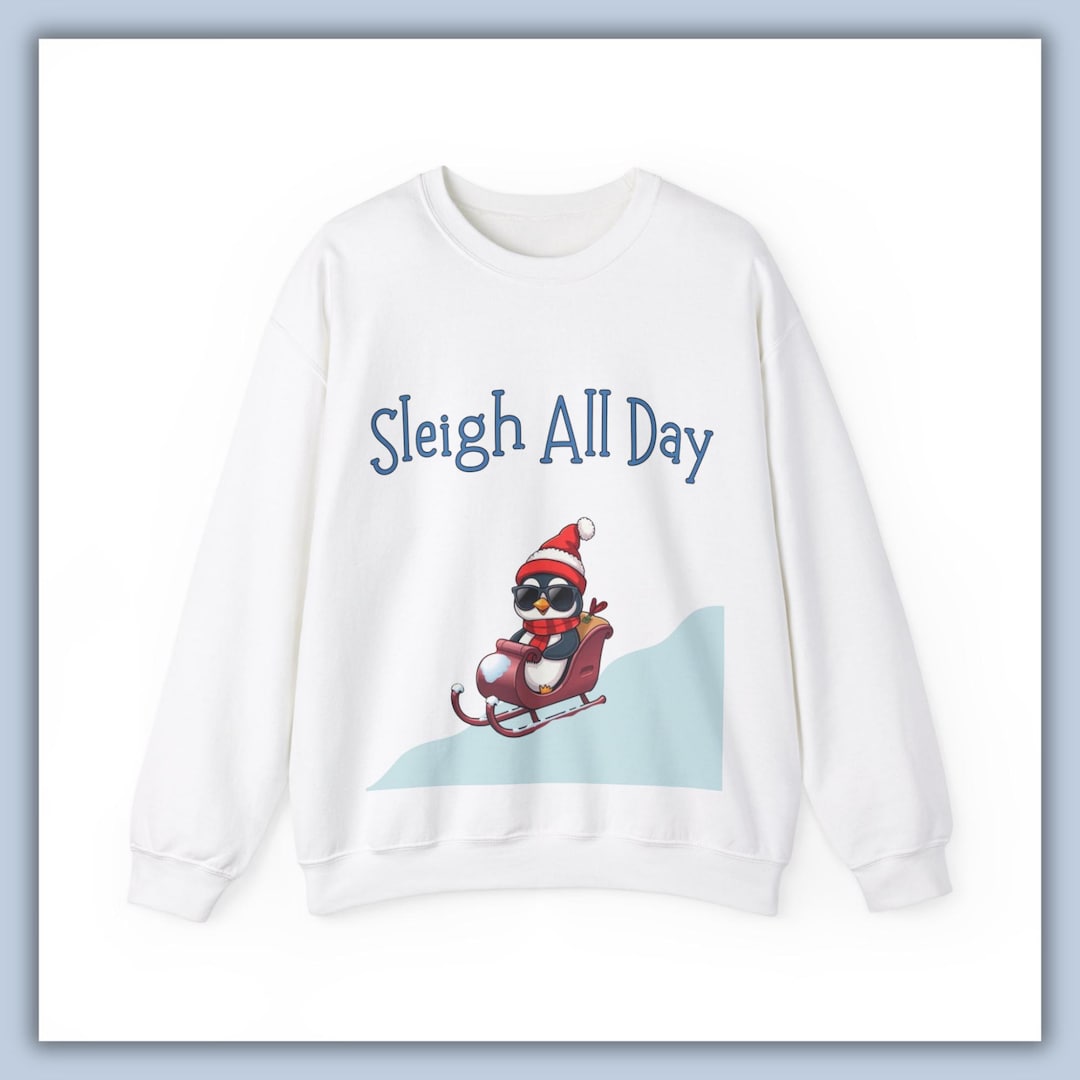 Funny Christmas Jumper - Penguin on a Sleigh Cartoon and Slogan ...