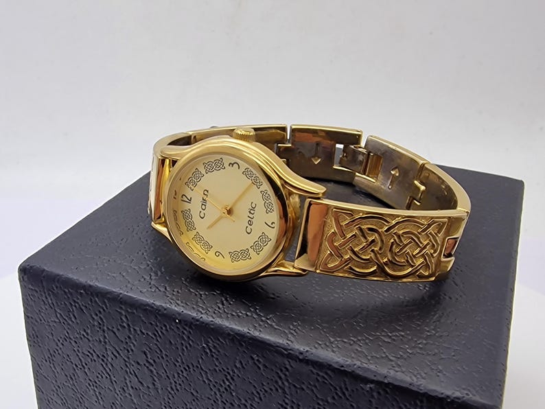 A Cairn Celtic Gold-plated Ladies Quartz Watch With Celtic Knot Design ...