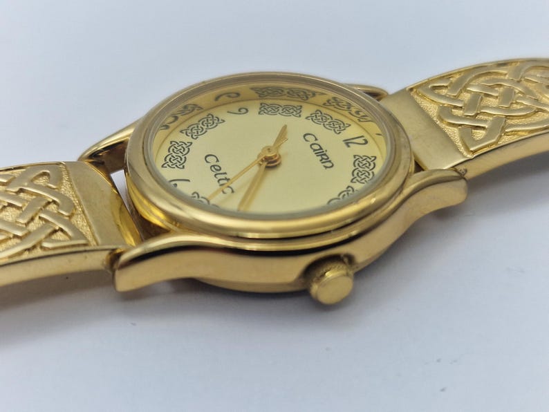 A Cairn Celtic Gold-plated Ladies Quartz Watch With Celtic Knot Design ...