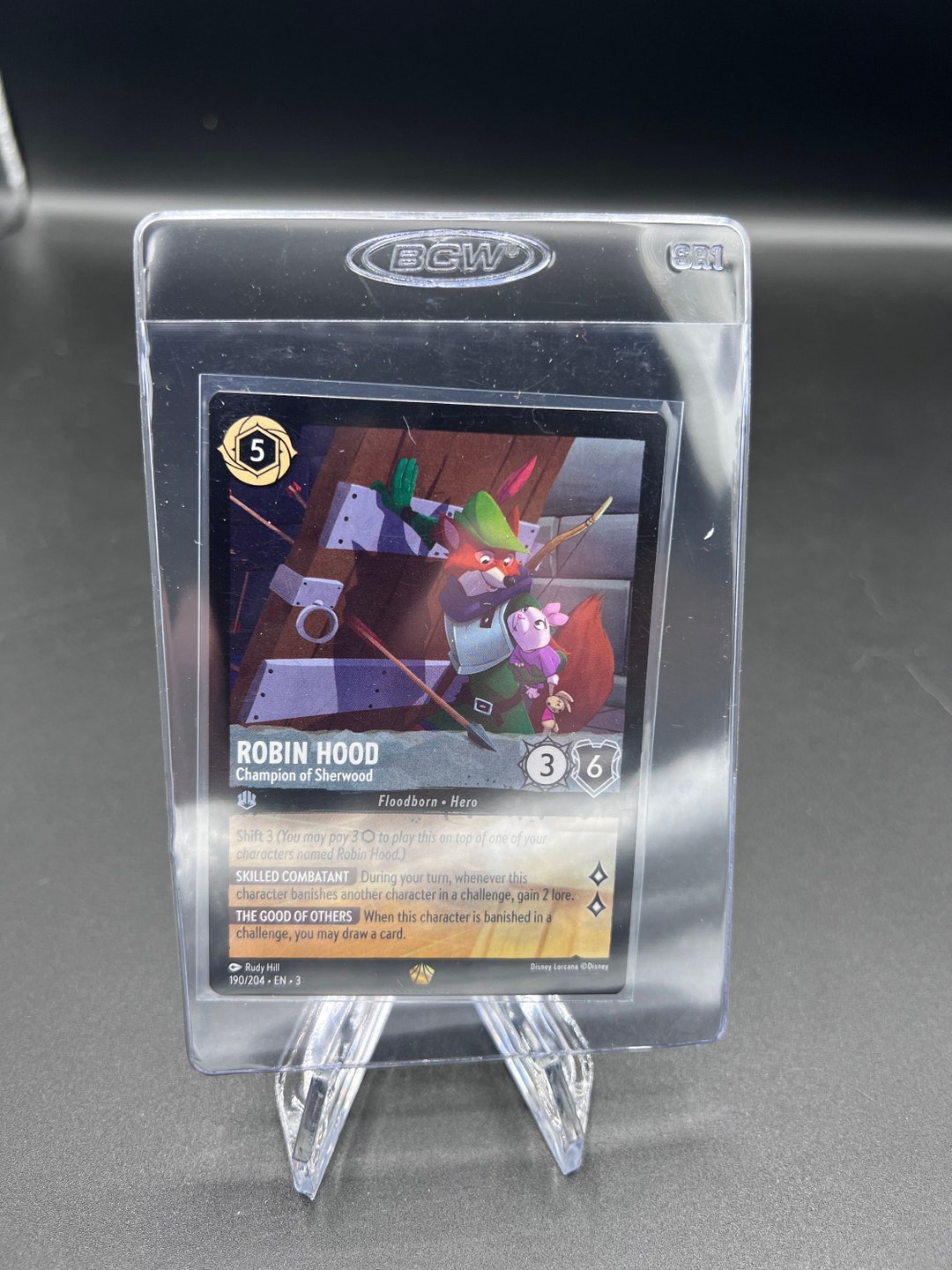 Disney Lorcana Robin Hood Champion of Sherwood Rise of the Floodborn ...