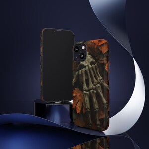 Skeletal Hand Halloween Phone Case Autumn Leaves and Graveyard Scene ...