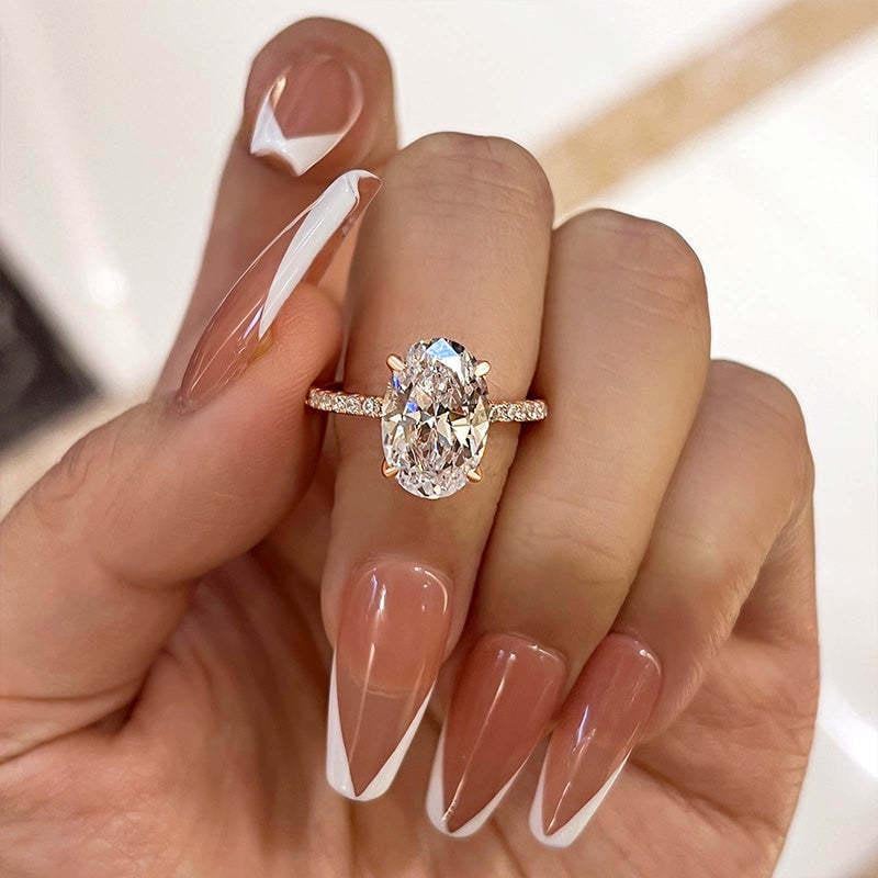 Oval cut diamond engagement rings store