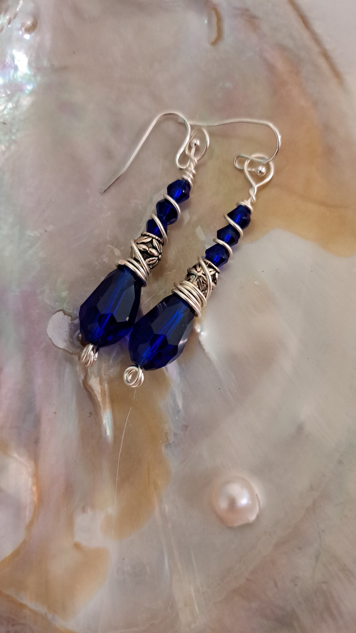 Cobalt Blue: Stunning Contrast of Blue Teardrop and Tiny Crystal Glass ...