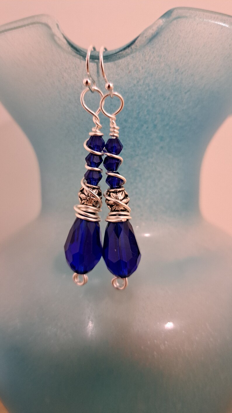 Cobalt Blue: Stunning Contrast of Blue Teardrop and Tiny Crystal Glass ...