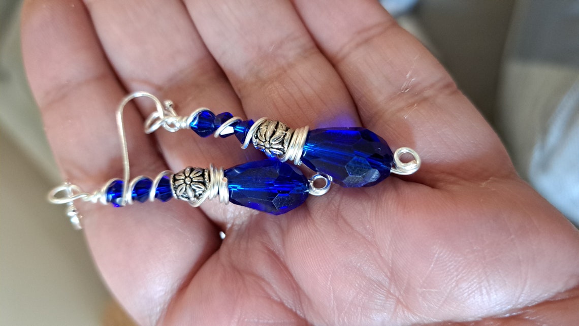 Cobalt Blue: Stunning Contrast of Blue Teardrop and Tiny Crystal Glass ...