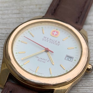 Wenger SAK Design Swiss Army Style 1990s Gold Quartz Watch Gold Bezel ...