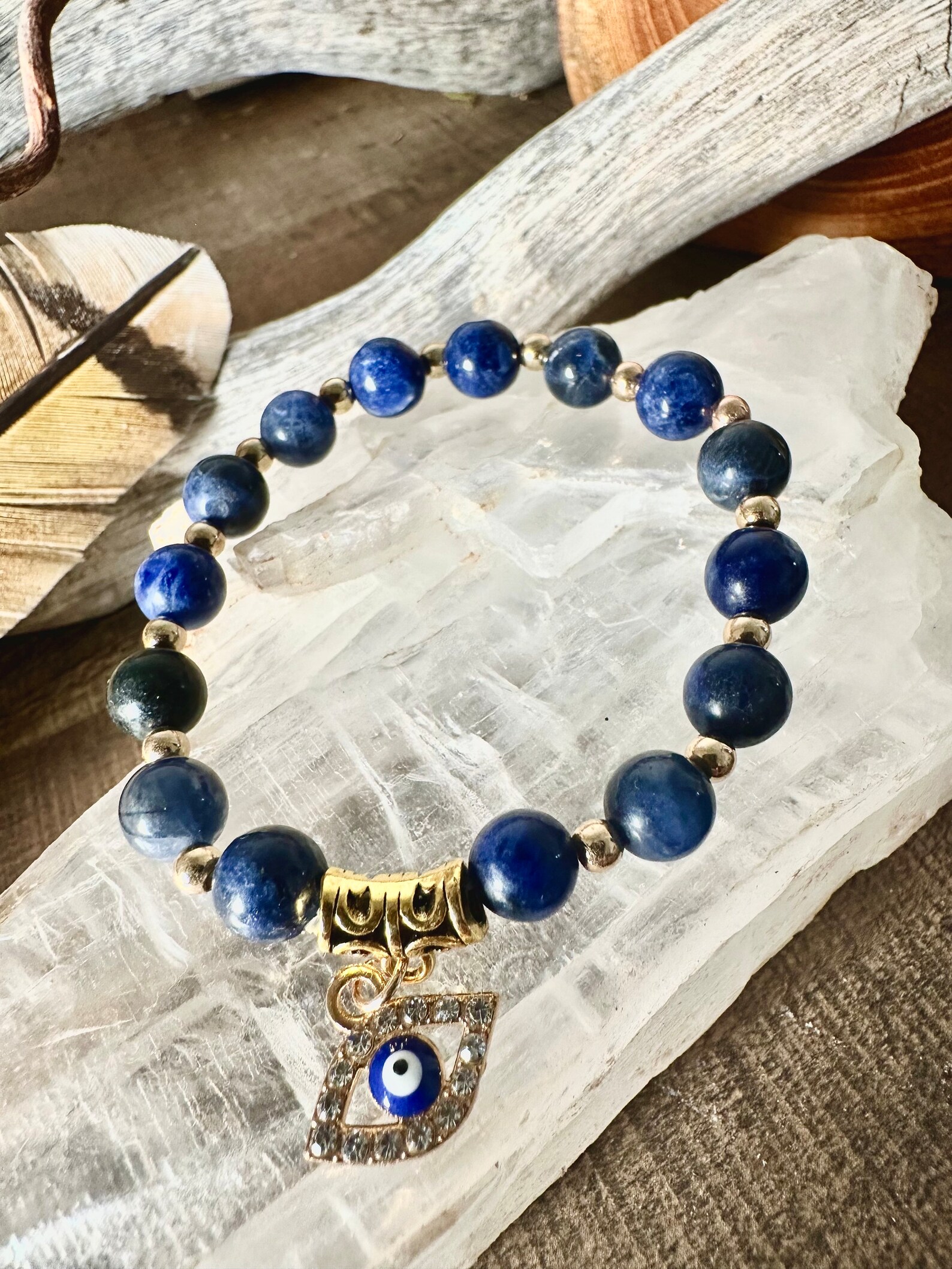 Mystical Radiance: All-seeing Eye Healing Properties Charm Bracelet ...
