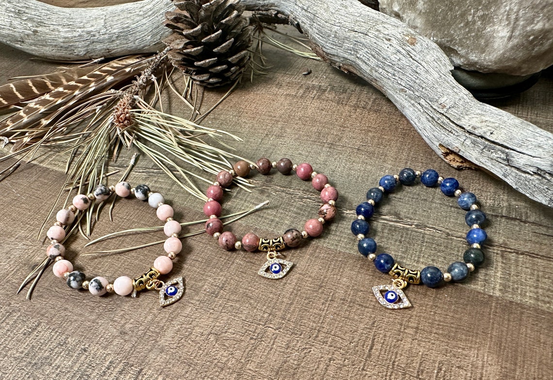Mystical Radiance: All-seeing Eye Healing Properties Charm Bracelet ...