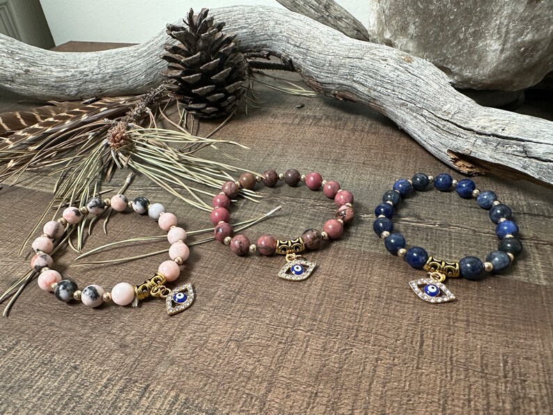 Mystical Radiance: All-seeing Eye Healing Properties Charm Bracelet ...