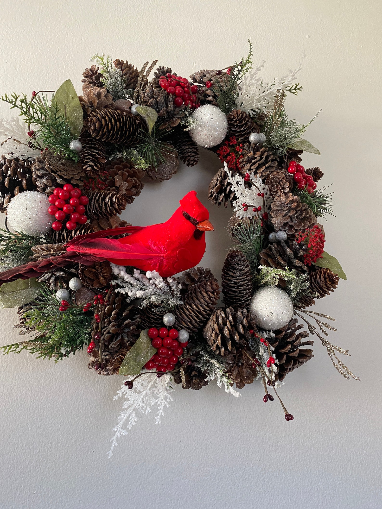 Christmas Wreath With Red Cardinal, Snow-covered Pinecones, Winter ...