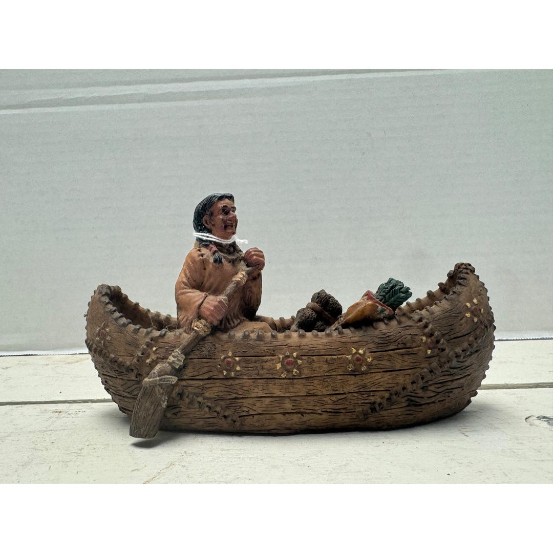 Handcrafted Native American-inspired Figurine in Canoe With Paddle ...