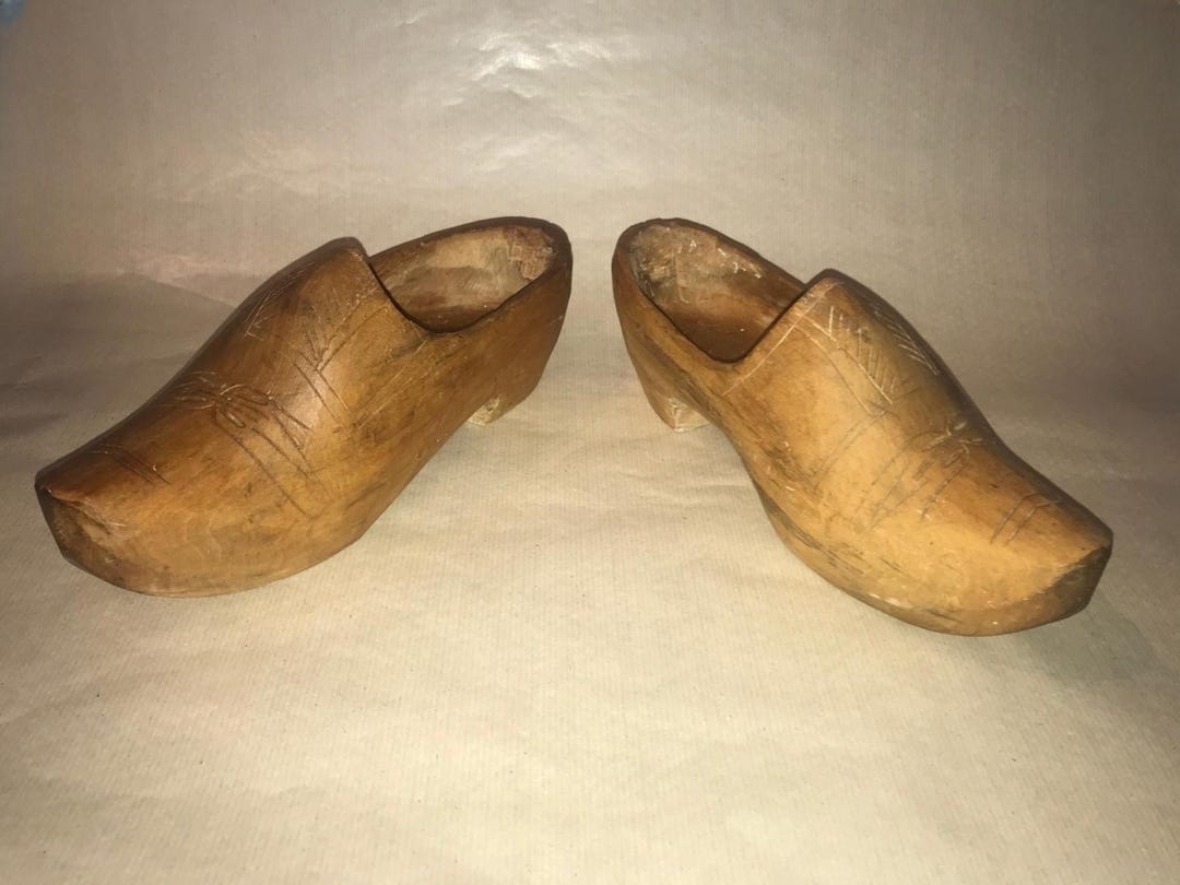 The Timeless Charm and Artistry of Vintage Pair of Hand-carved Wooden ...
