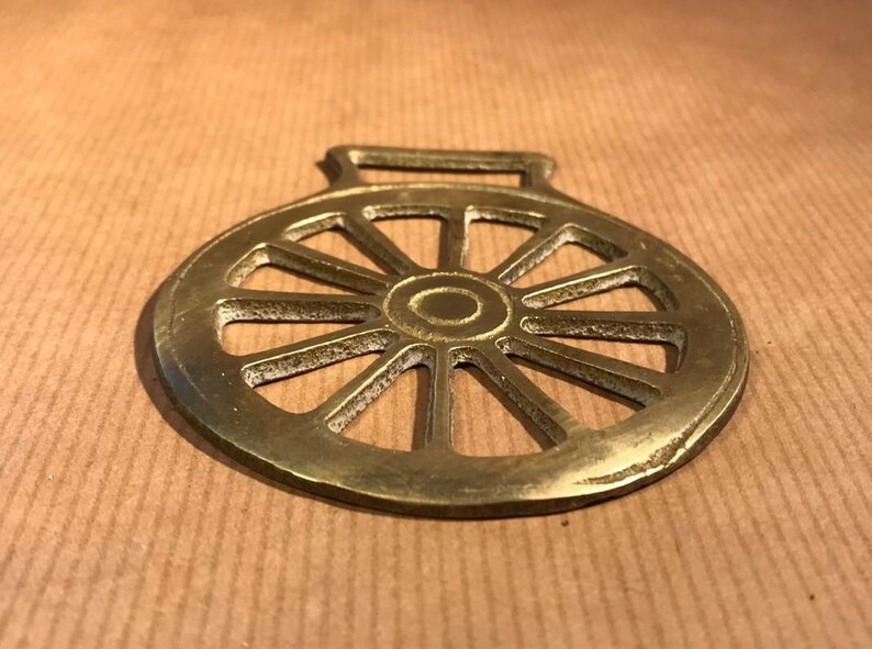 Timeless Traditions: Vintage Wagon Wheel Horse Brass Martingale ...