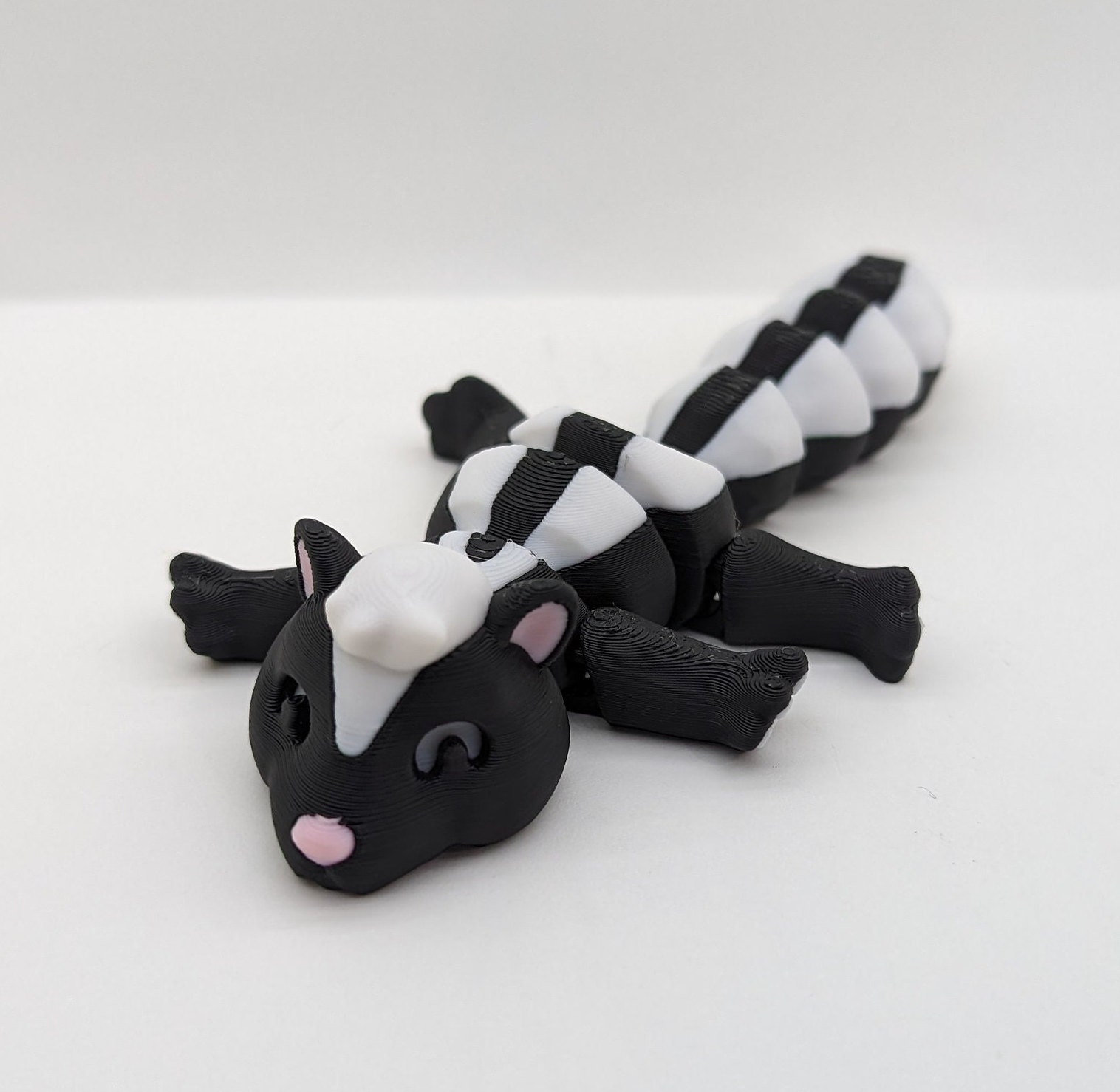Funky Skunky Articulated Fidget Toy - Etsy