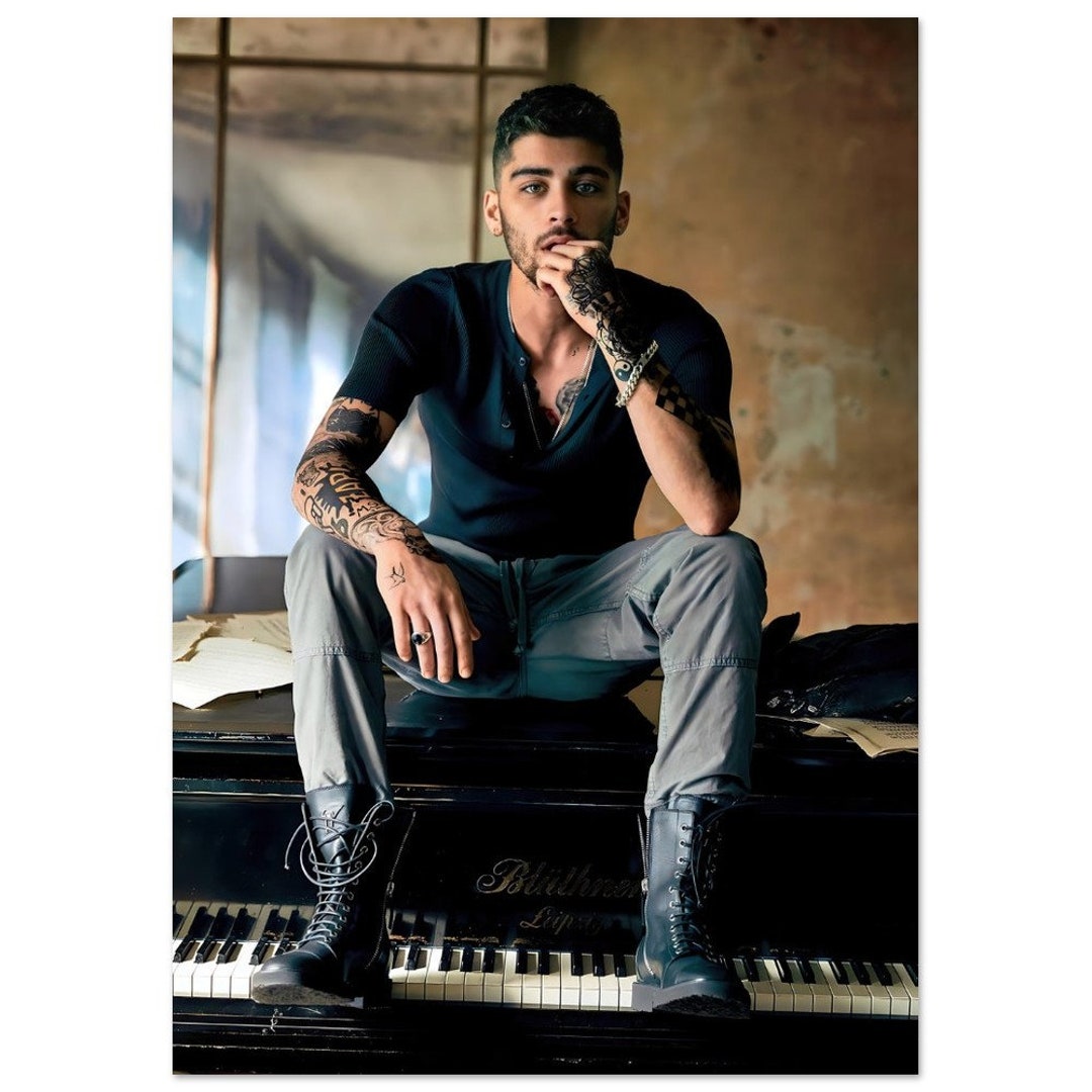 Zayn Malik Captured Moment Sitting on a Piano Captivating Zayn Malik ...