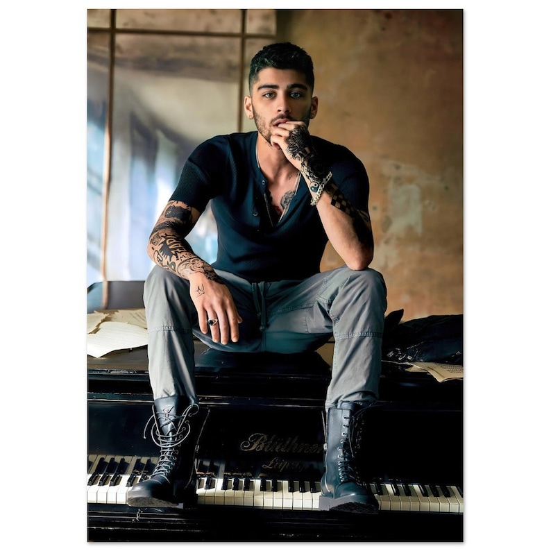 Zayn Malik Captured Moment Sitting on a Piano Captivating Zayn Malik ...