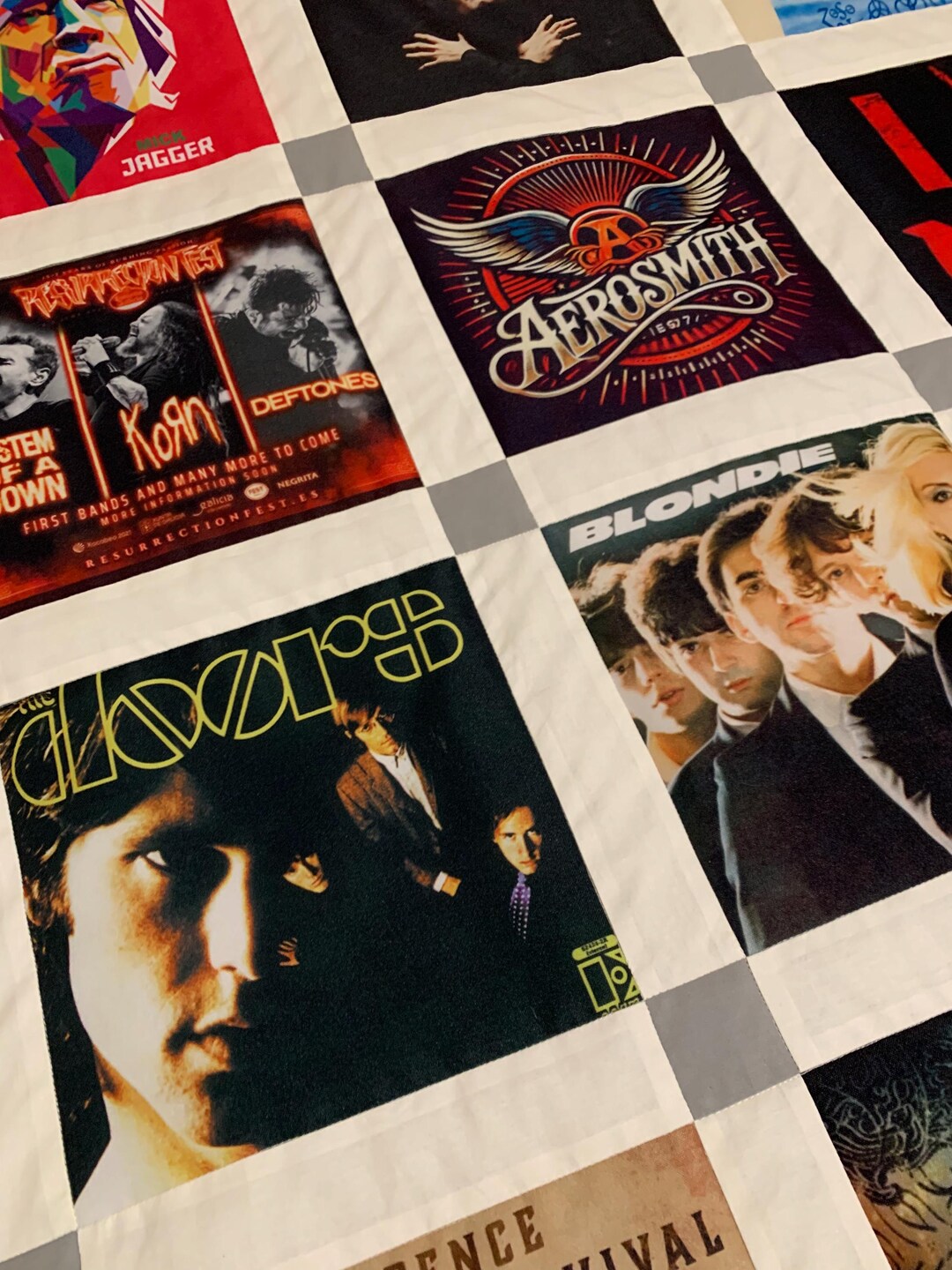 A Patchwork Quilt With Photos of Musicians and Vinyl Covers on Fabric ...