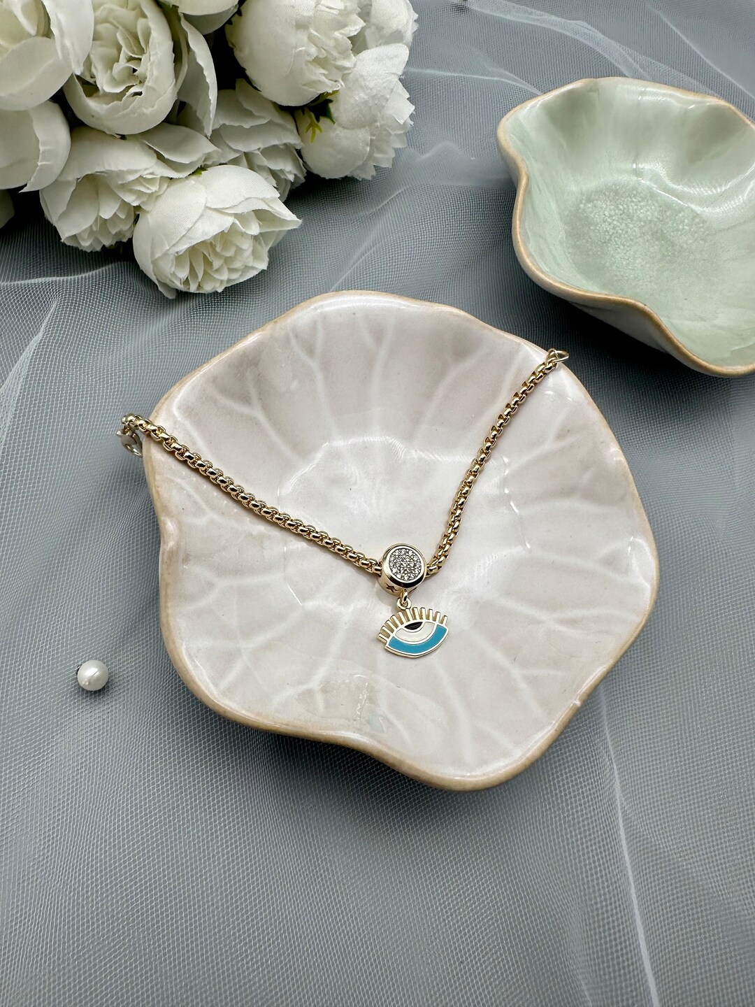 Enchanting Bracelet With a Seductive Evil Eye Pendant Decorated With ...