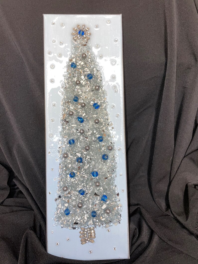 Beautiful Silver Glass Christmas Tree With Blue and Silver Accents on ...