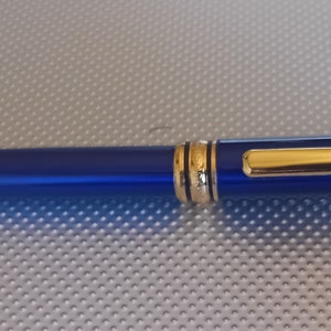 Blue Electric Ballpoint Metal Pen With Gold Ring and Clip Has a New ...