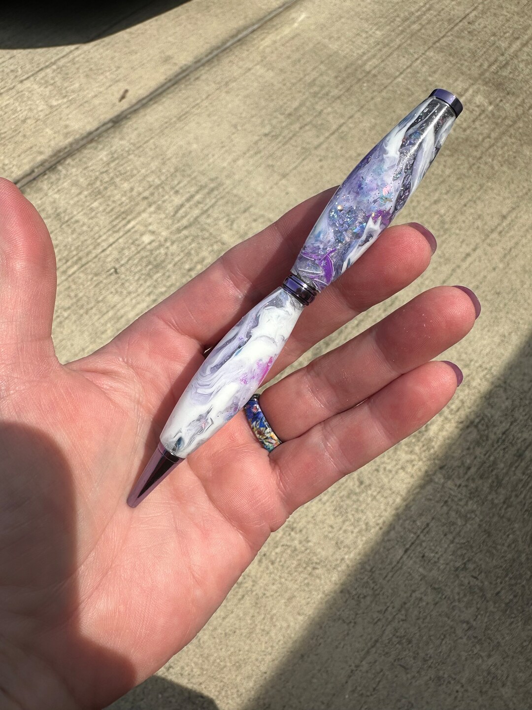 White and Clear Alumilite With Purple & Blue Glitter on a Purple ...