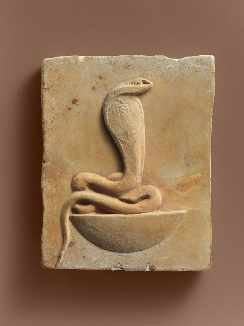 Sacred Symbolism Unveiled: Relief Plaque of Cobra on Neb Basket ...
