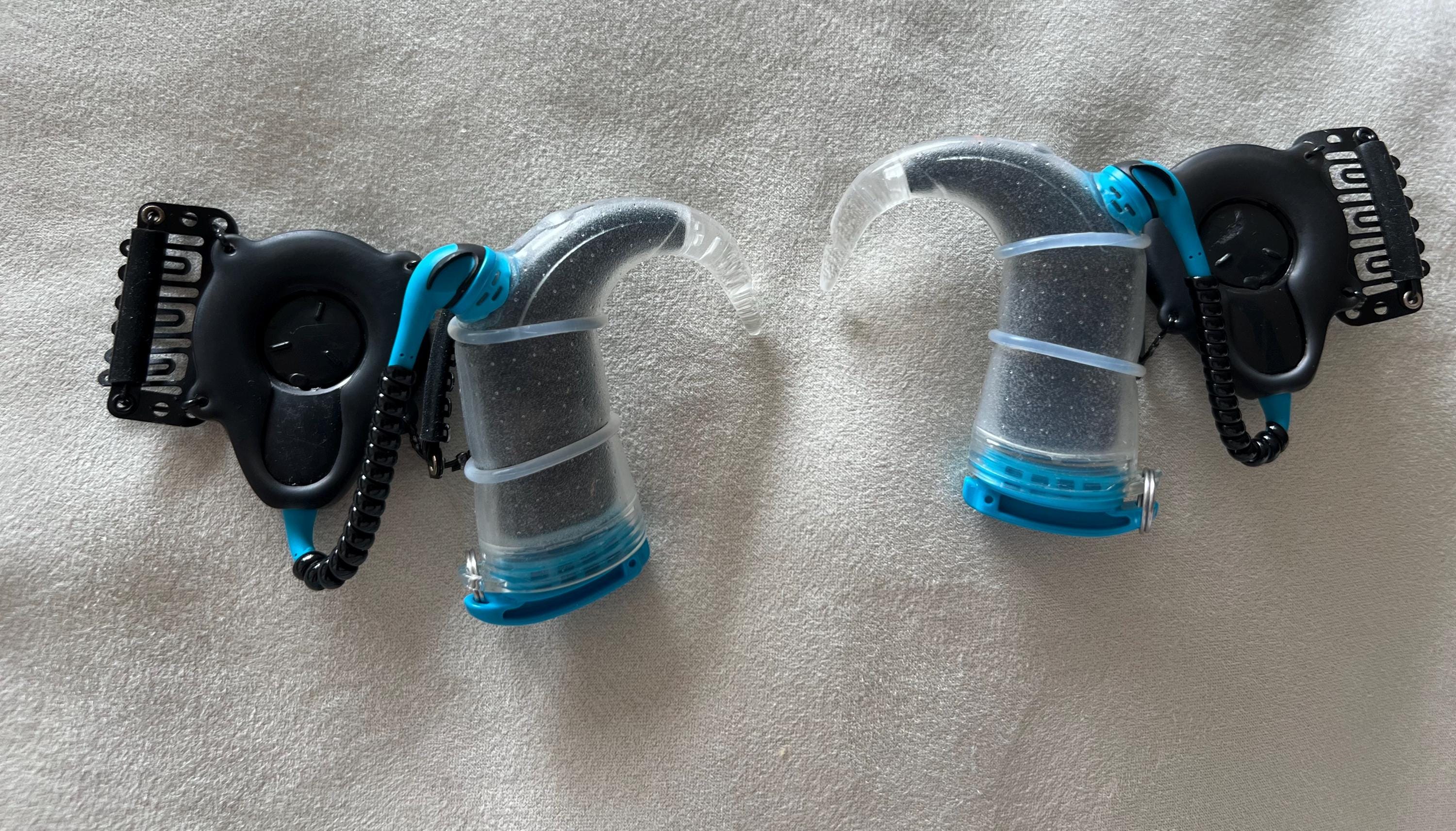 A Resin Case Pin for Securing a Cochlear Implant Compatible With Aqua ...