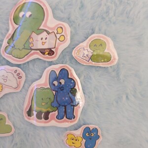 HOSTS AND CONTESTANTS Holographic Sticker Pack Battle for Dream Island ...