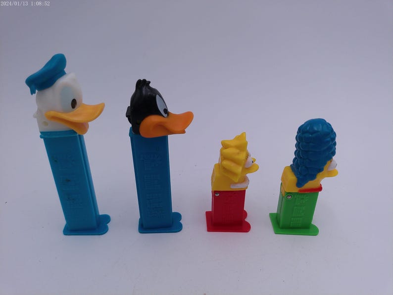 Pez Dispenser Donald Duck Daffy Duck Simpsons - Etsy
