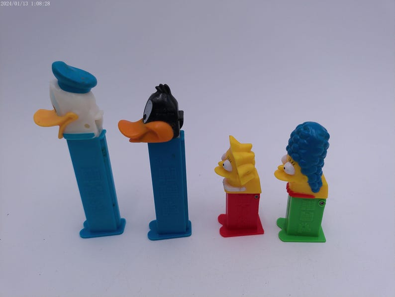 Pez Dispenser Donald Duck Daffy Duck Simpsons - Etsy