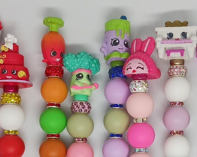 3 Shopkins Fun Packs. 5 Character Cards, 1 Sticker + 1 Pop-up Card per ...
