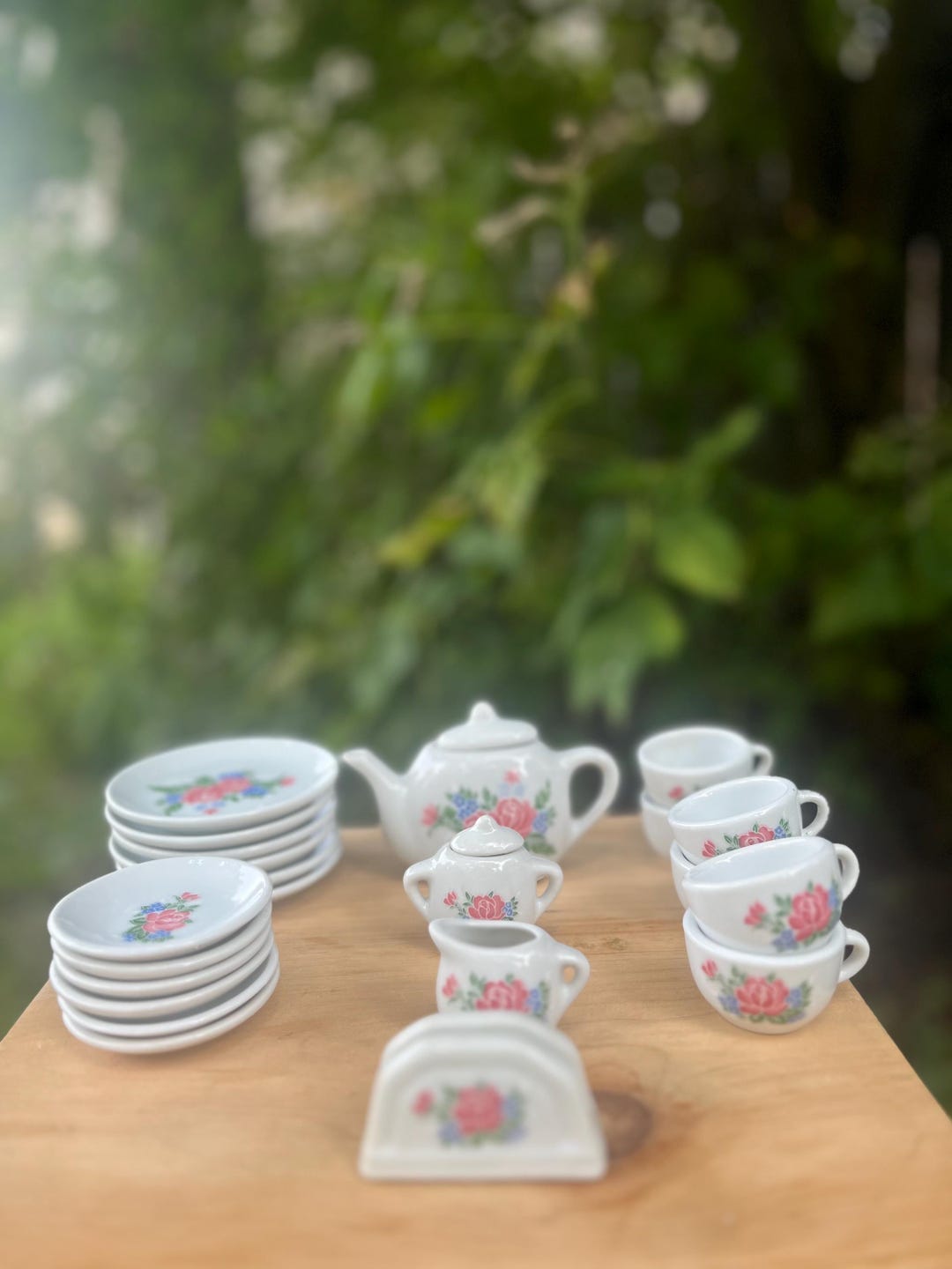 Porcelain Miniature Tea Set With Tea Pot, Sugar Bowl, Creamer, Cups and ...