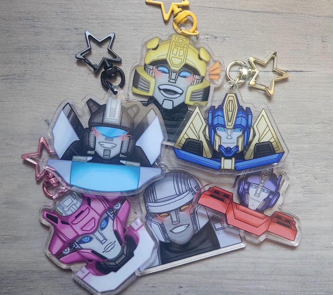 Transformers One 2.5" Acrylic Charms Featuring Elita-1 / D-16 / B-127 ...