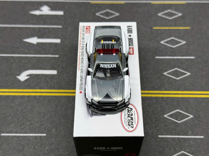 Mini GT x Kaido House R34 Police V2 Chase KHMG120 fundido a presión ...