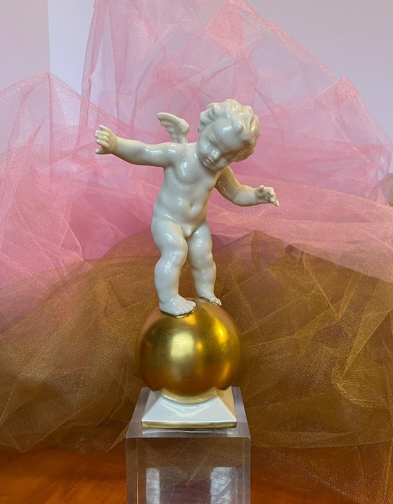 Cherub/putto on Gold Gilded Ball Designed by Karl Tutter Made by the ...